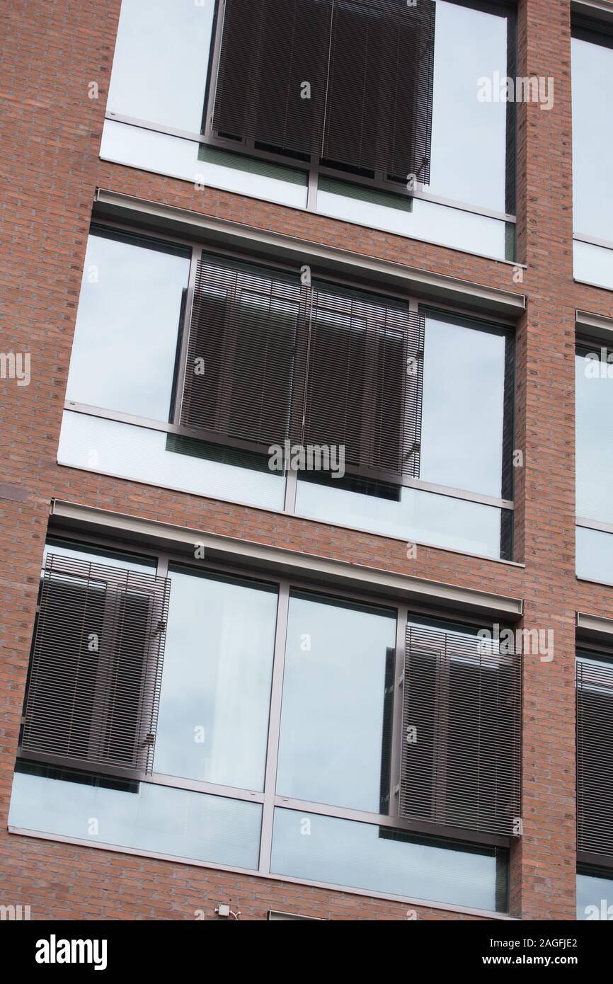 Windows covered with metal wire mesh Stock Photo - Alamy