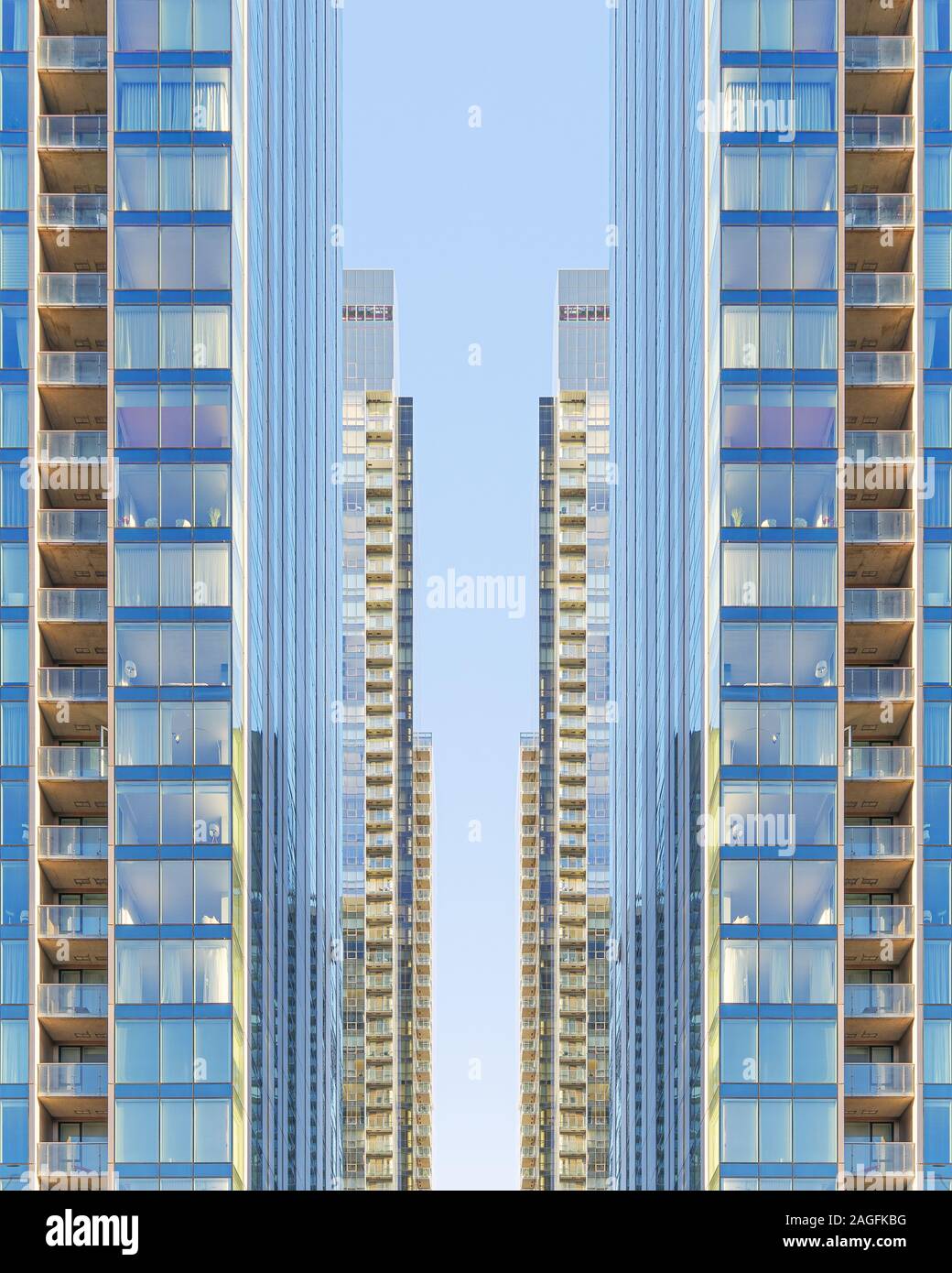 Vertical shot of the symmetrical glass buildings in downtown Montreal ...