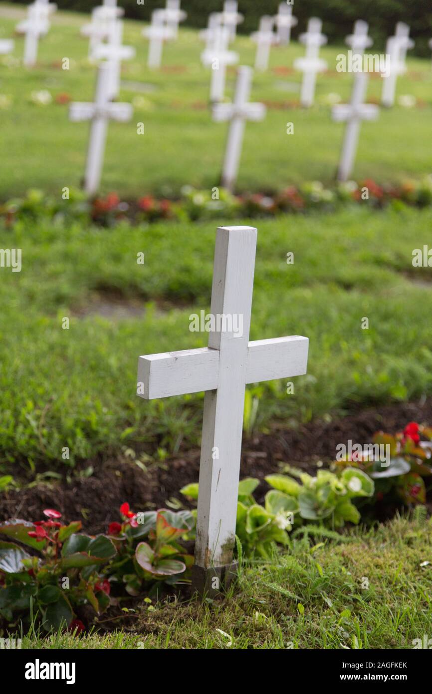 Graveyard or a cemetary with graves showing Stock Photo - Alamy