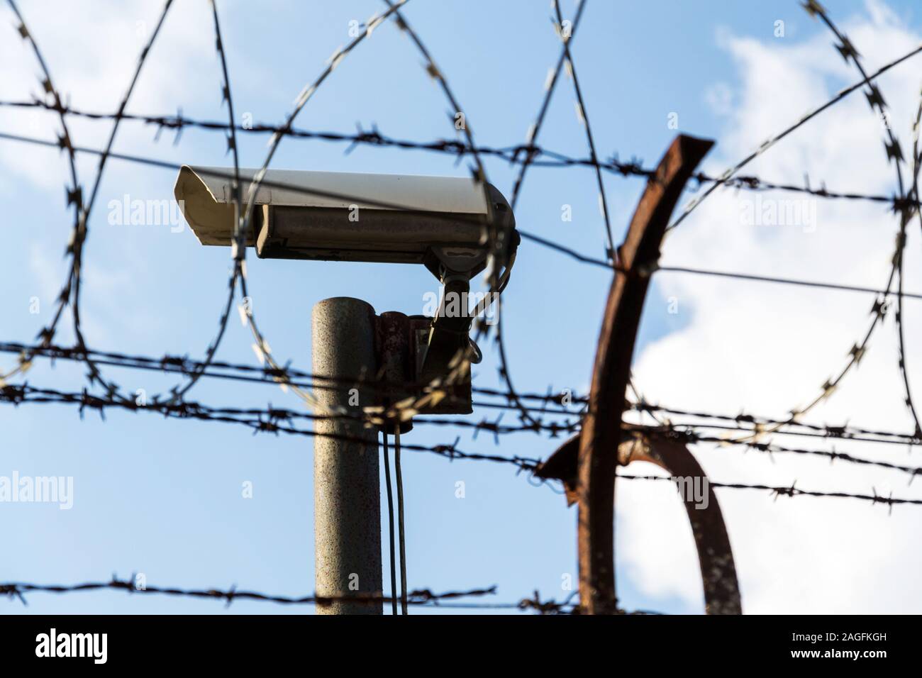 Razor wire fence cctv camera hi-res stock photography and images - Alamy