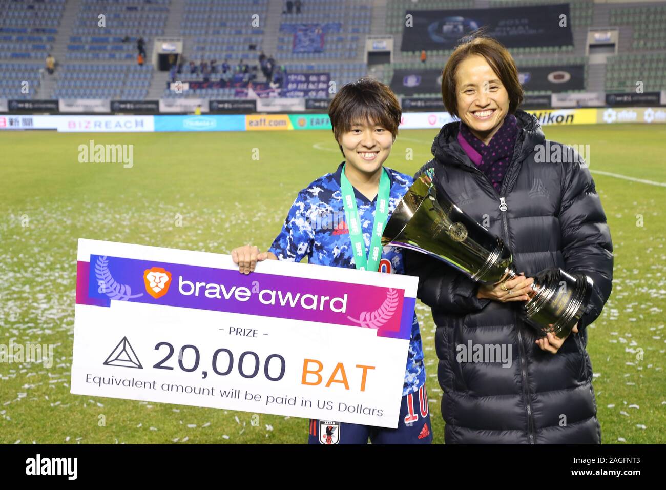 Japan's Yuka Momiki (L) head coach Asako Takakura celebrate winning ...