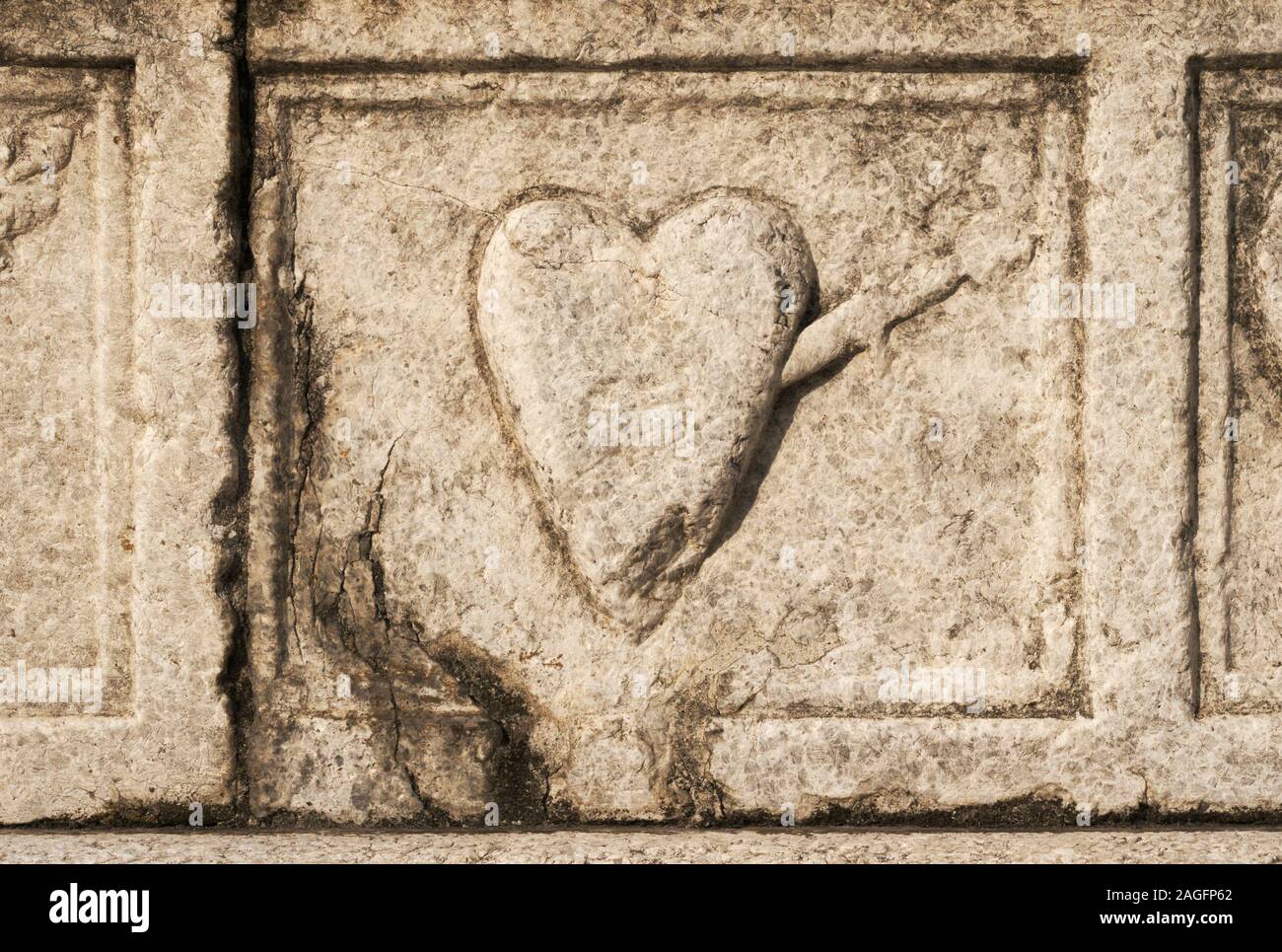 carved heart shape on stone wall of a medieval church Stock Photo - Alamy