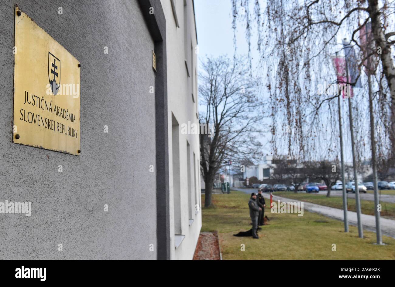 Pezinok, Slovakia. 19th Dec, 2019. The policemen with dogs guard the ...