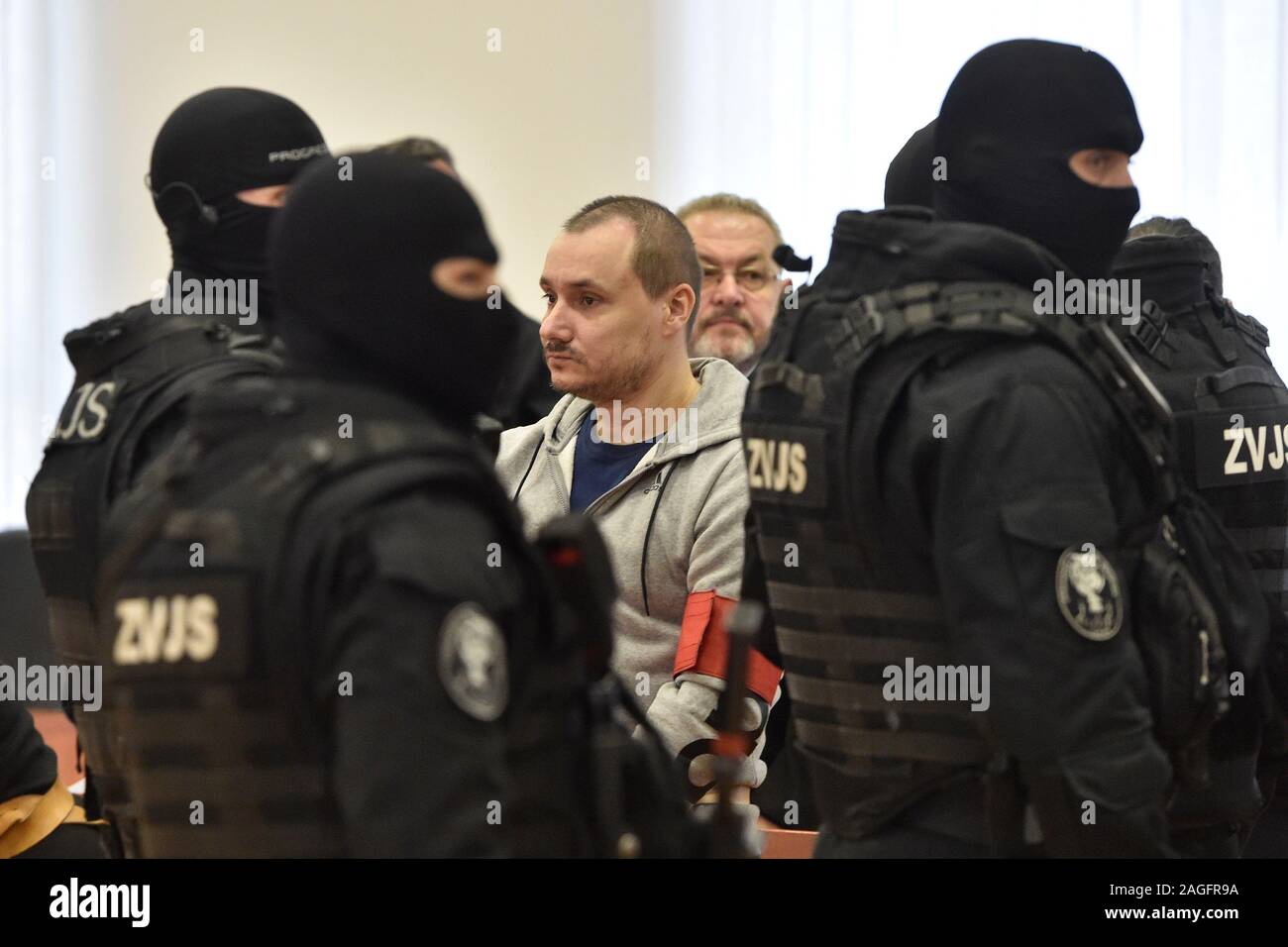 Pezinok, Slovakia. 19th Dec, 2019. Tomas Szabo is escorted in a ...