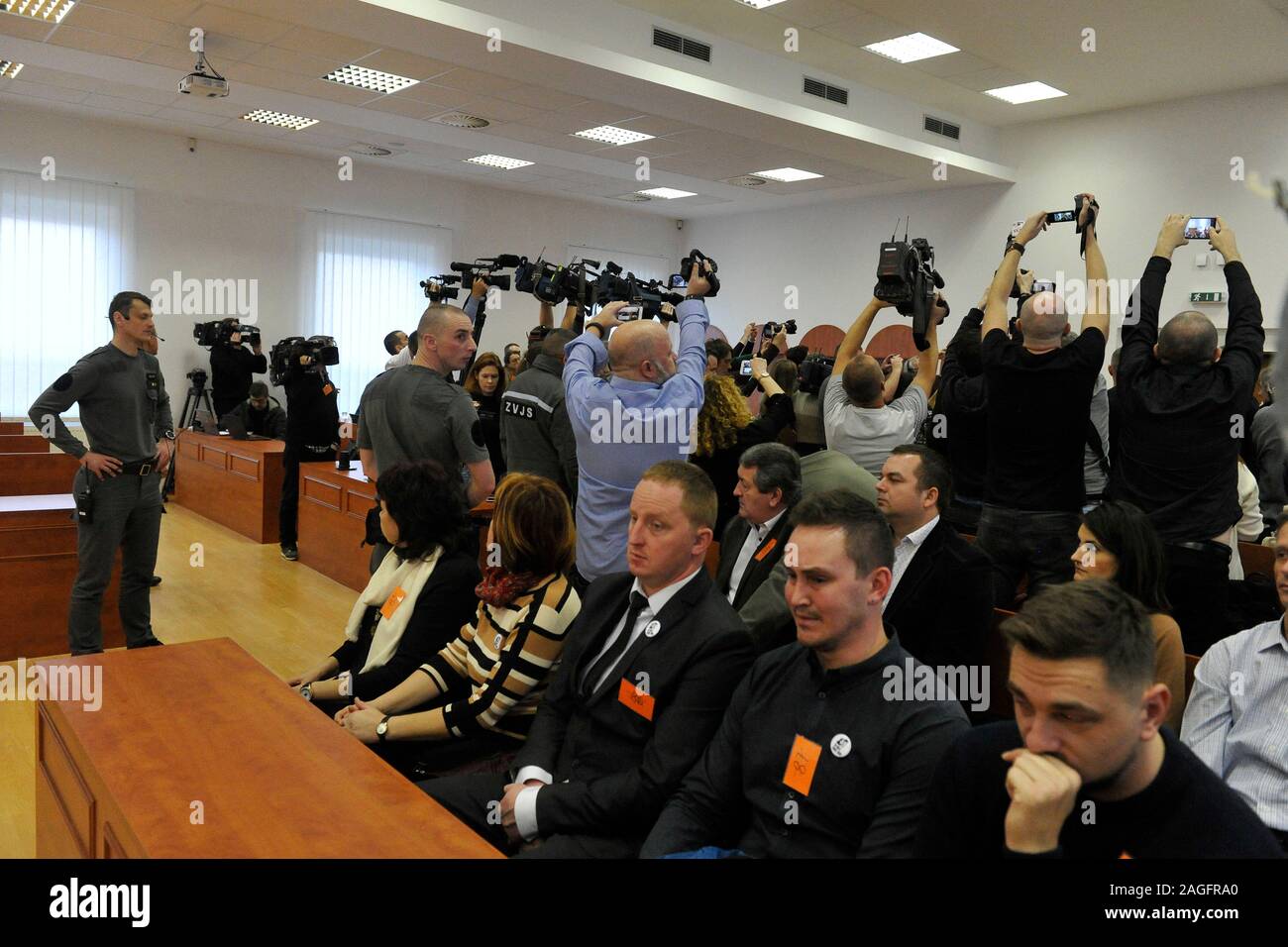 Pezinok, Slovakia. 19th Dec, 2019. Journalist await the accused being ...
