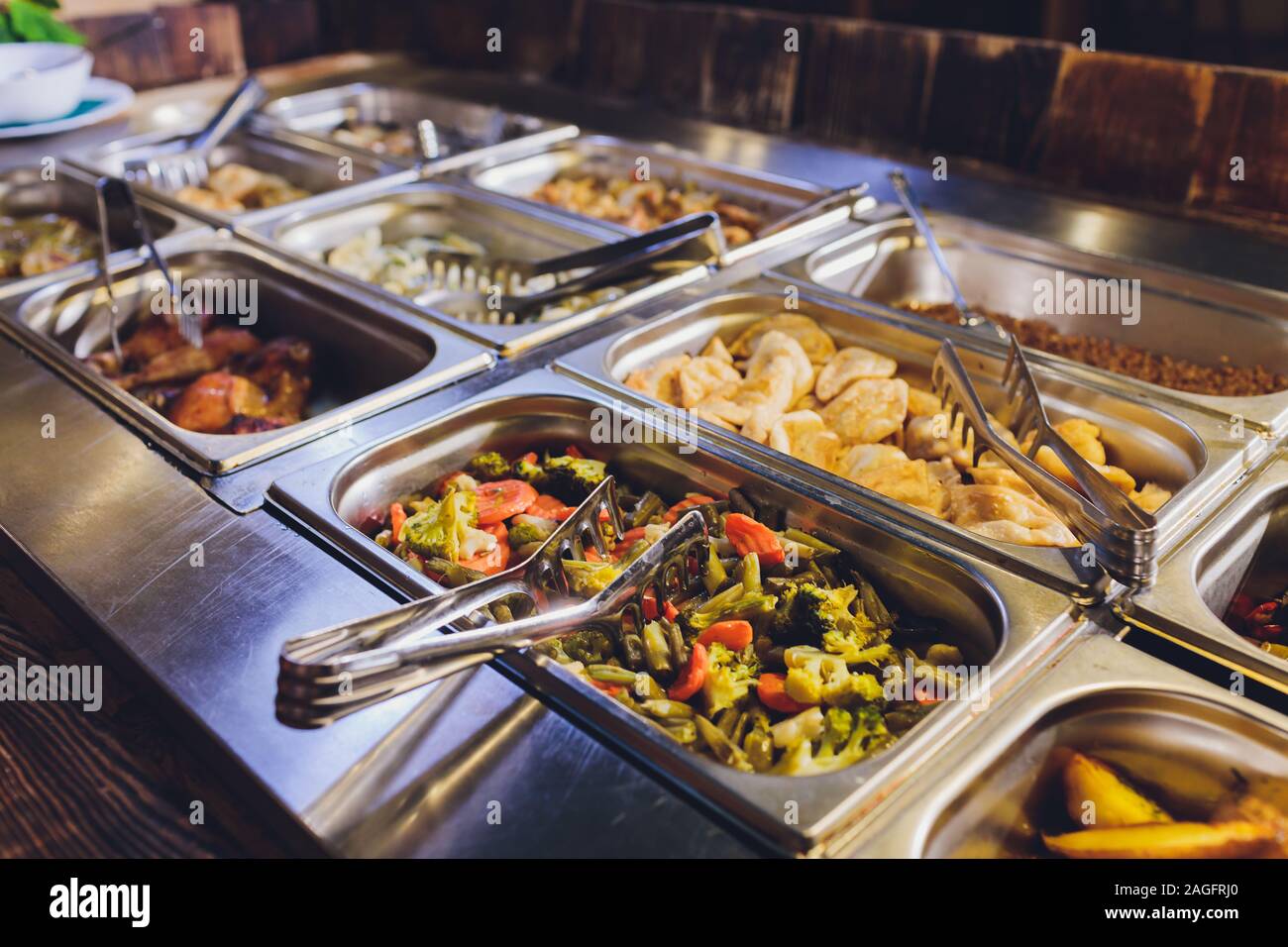 Full food showcase of variety meals bar Stock Photo - Alamy