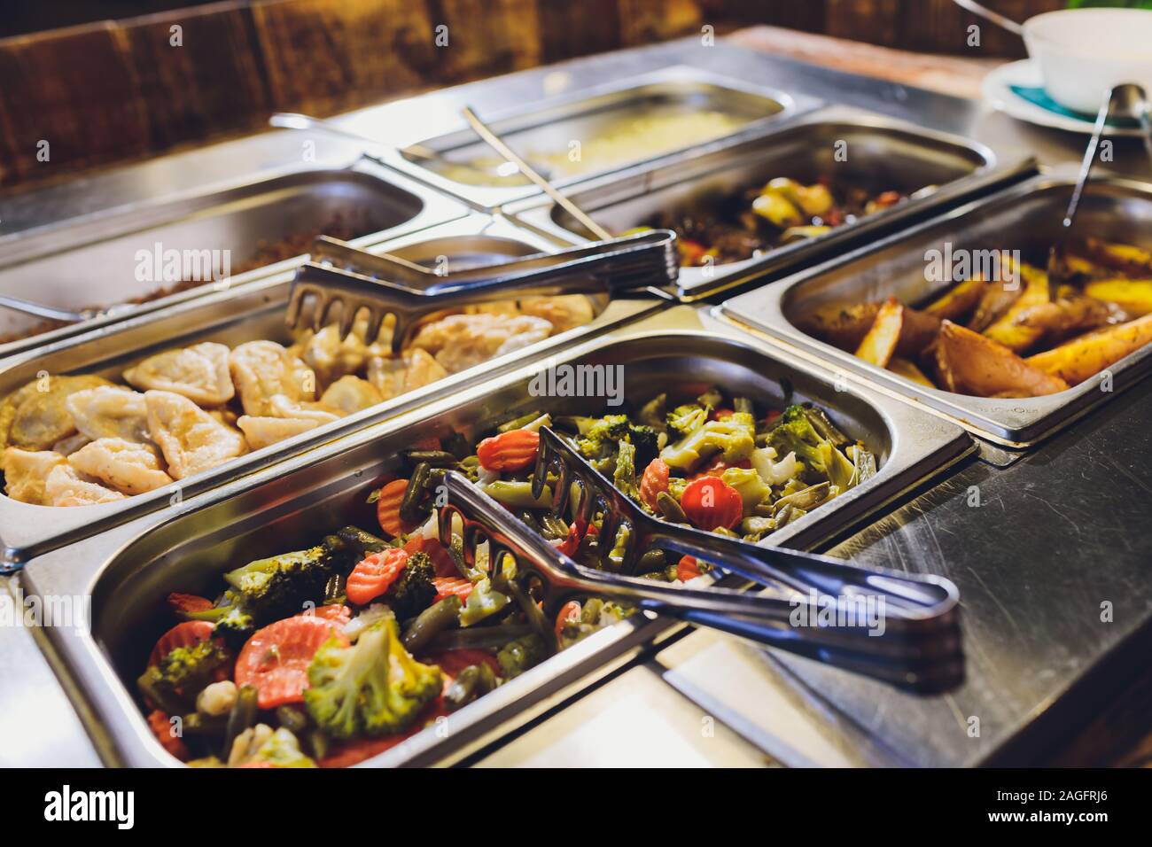 Full food showcase of variety meals bar Stock Photo - Alamy