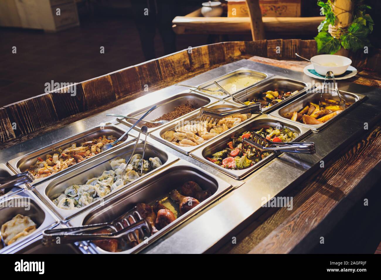 Full food showcase of variety meals bar Stock Photo - Alamy