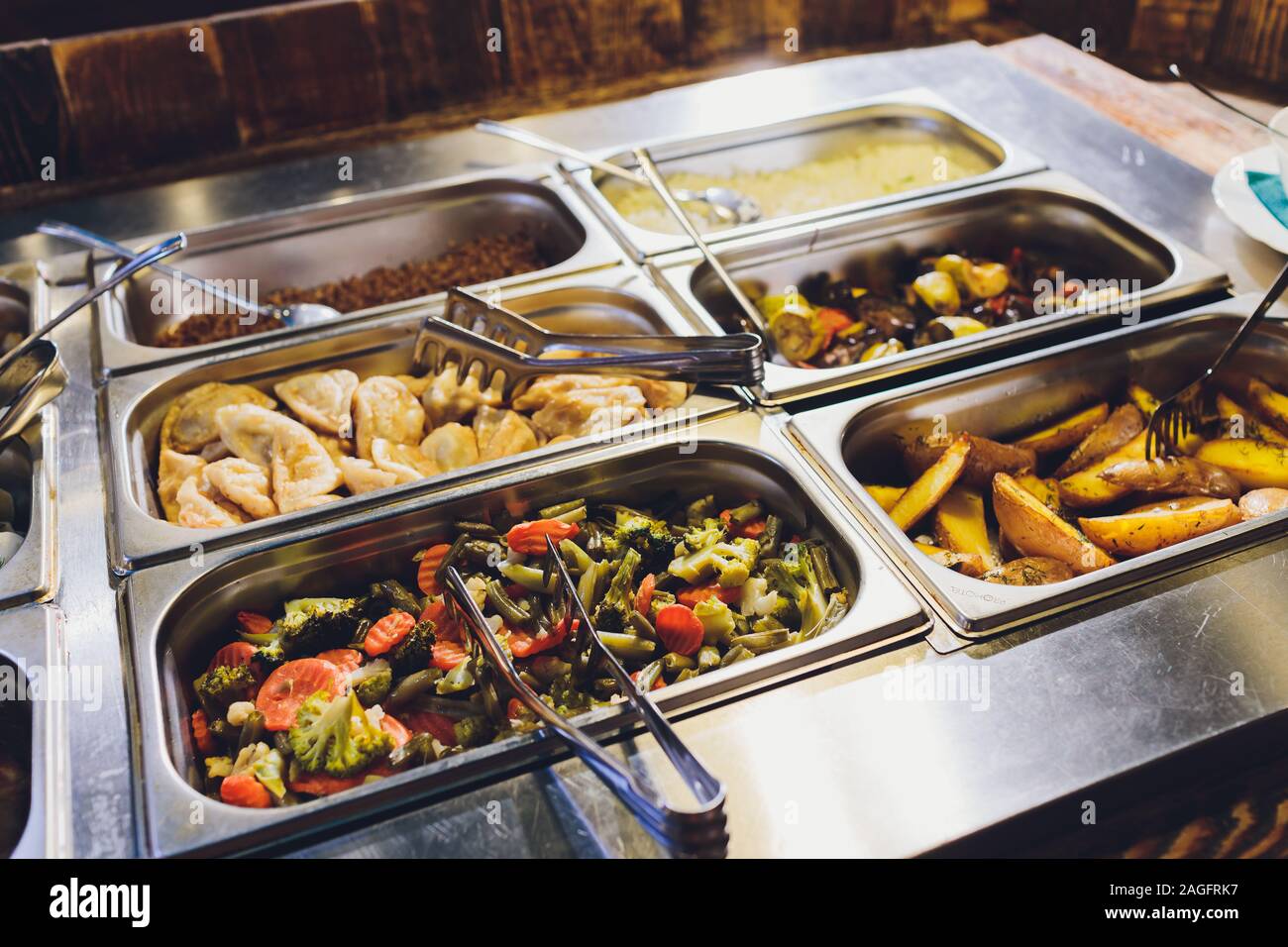 Full food showcase of variety meals bar Stock Photo - Alamy