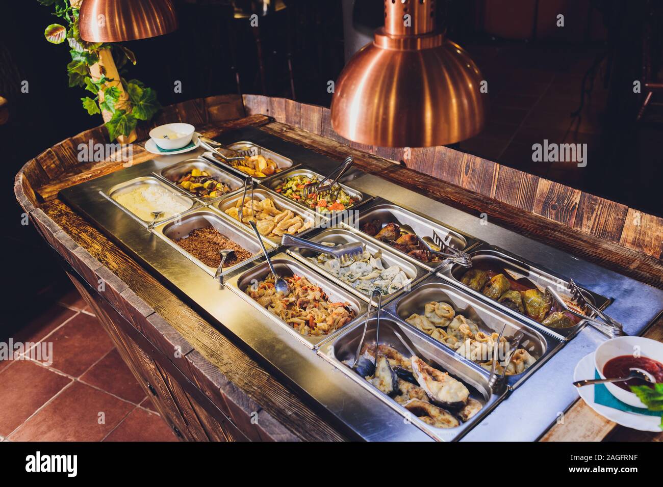 Full food showcase of variety meals bar Stock Photo - Alamy