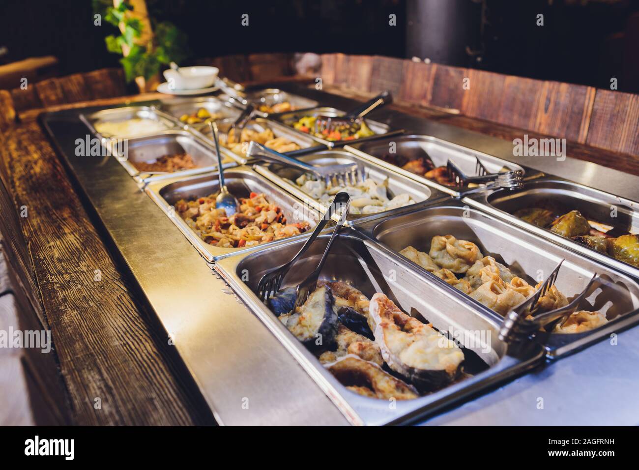 Full food showcase of variety meals bar Stock Photo - Alamy
