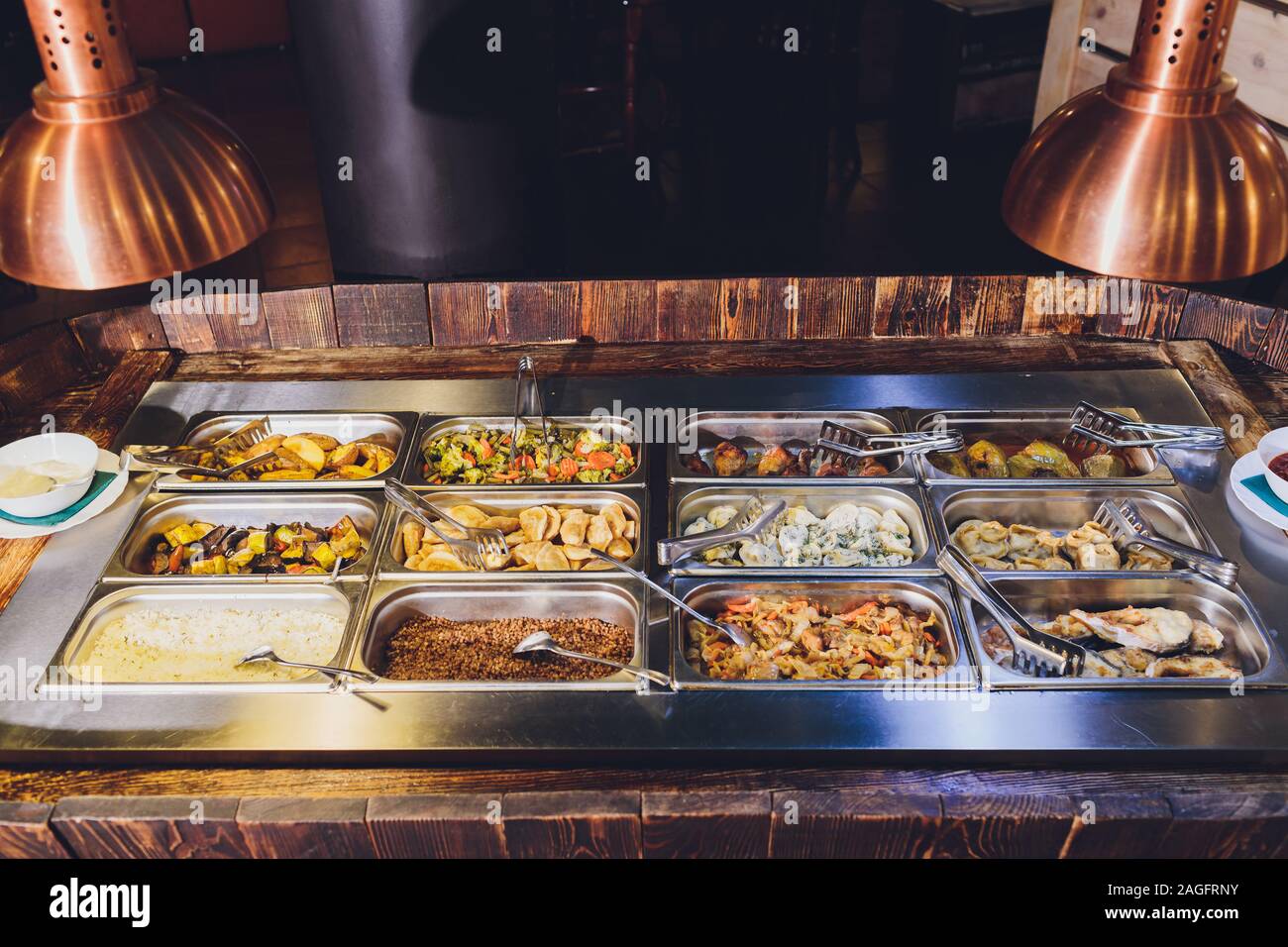 Full food showcase of variety meals bar Stock Photo - Alamy