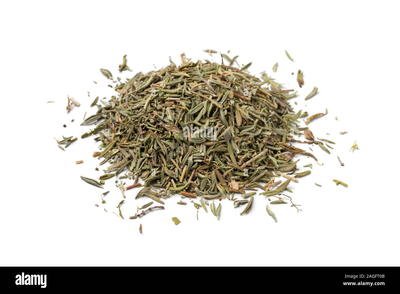 Heap of dried thyme leaves isolated on white background Stock Photo - Alamy