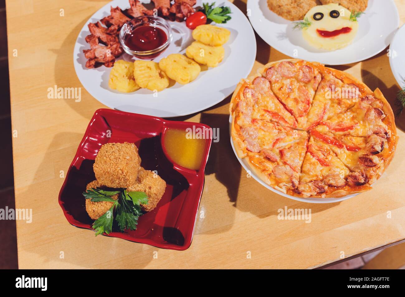 Child food. Funny food. Plate with cutlets and mashed potatoes in the ...