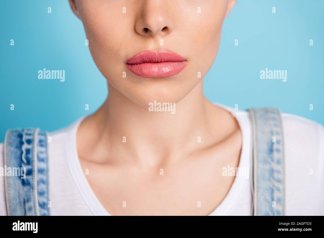 Cropped photo of lady showing her lips wearing white t-shirt denim ...