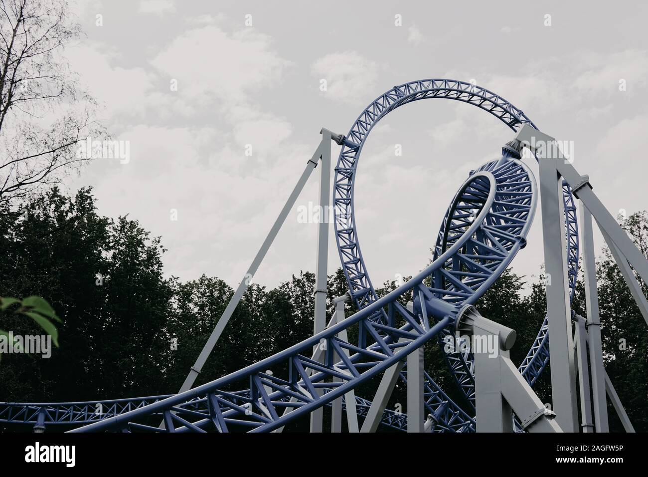 roller coaster attractions fun in the park for children Stock Photo - Alamy