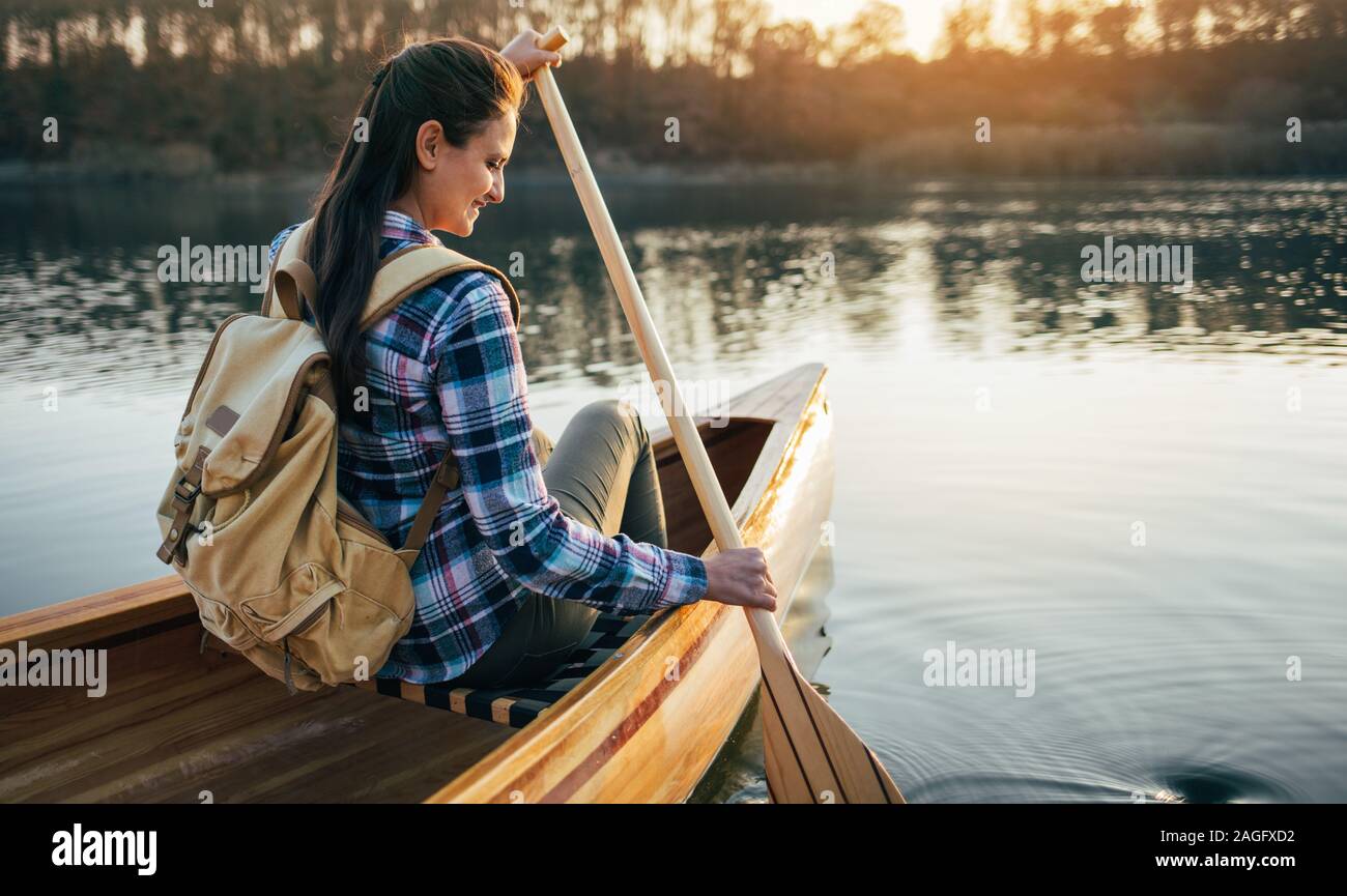 Rear view woman rowing hi-res stock photography and images - Alamy