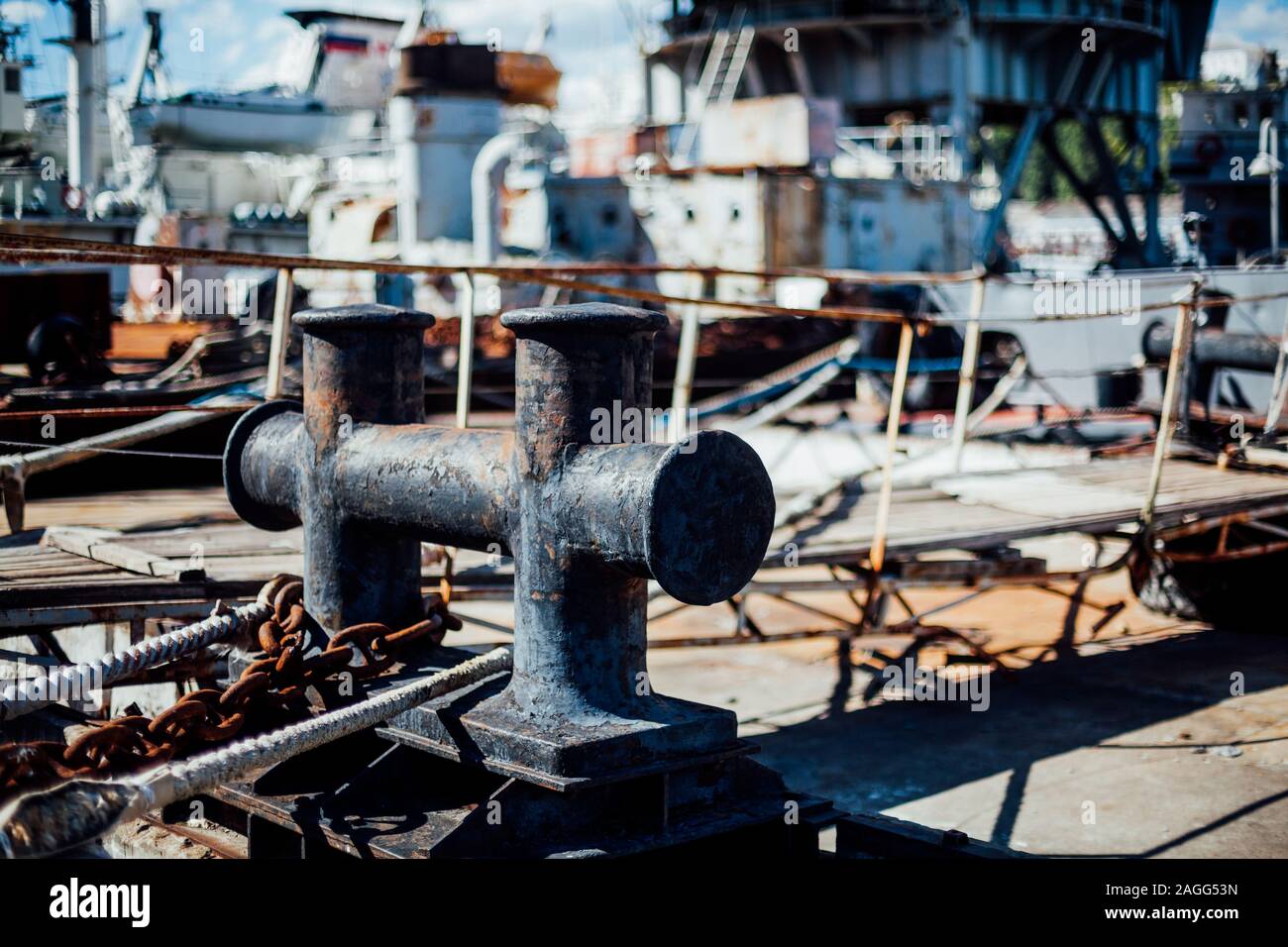 the ship is moored to a dock ladder rope chain Stock Photo - Alamy