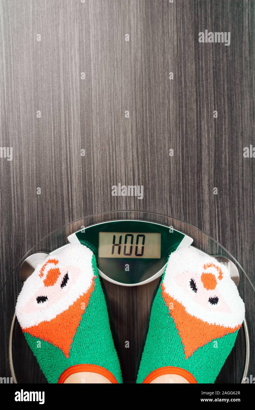 Fat woman scales hi-res stock photography and images - Alamy
