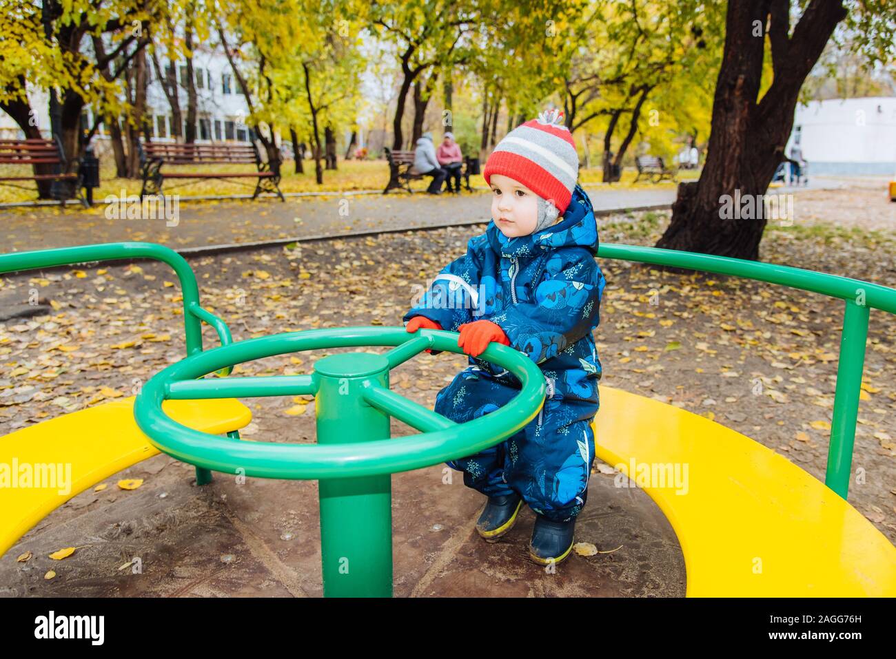 Spinning swing child hi-res stock photography and images - Alamy