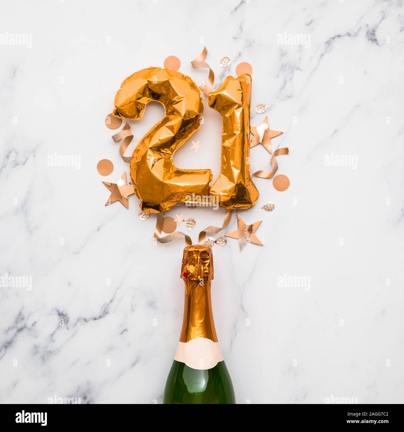 Champagne bottle with gold number 21 balloon. Minimal party anniversary ...