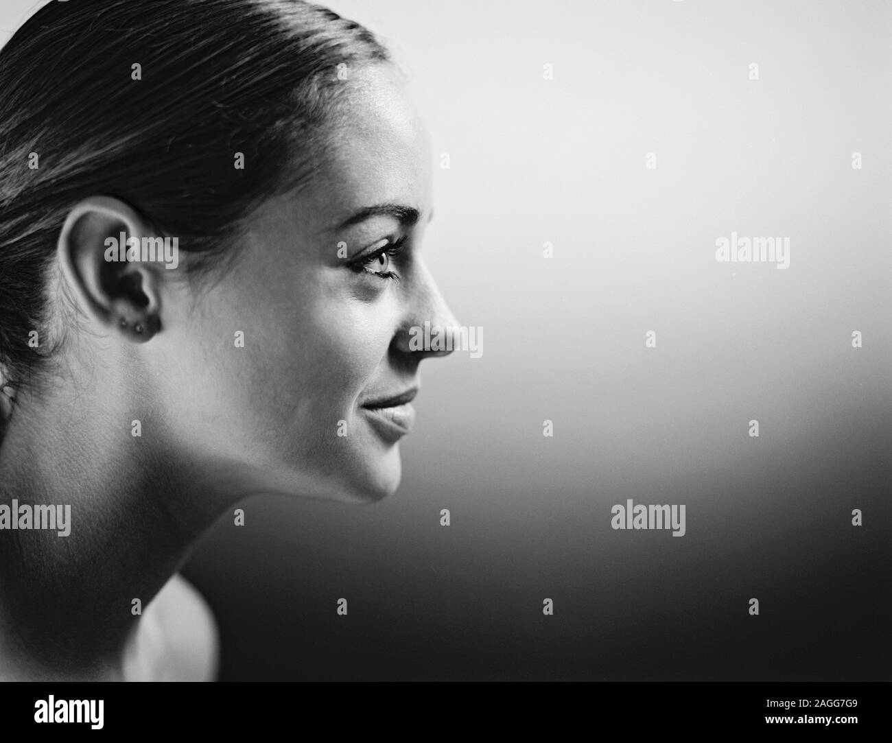 Girl smiling face profile Black and White Stock Photos & Images - Alamy