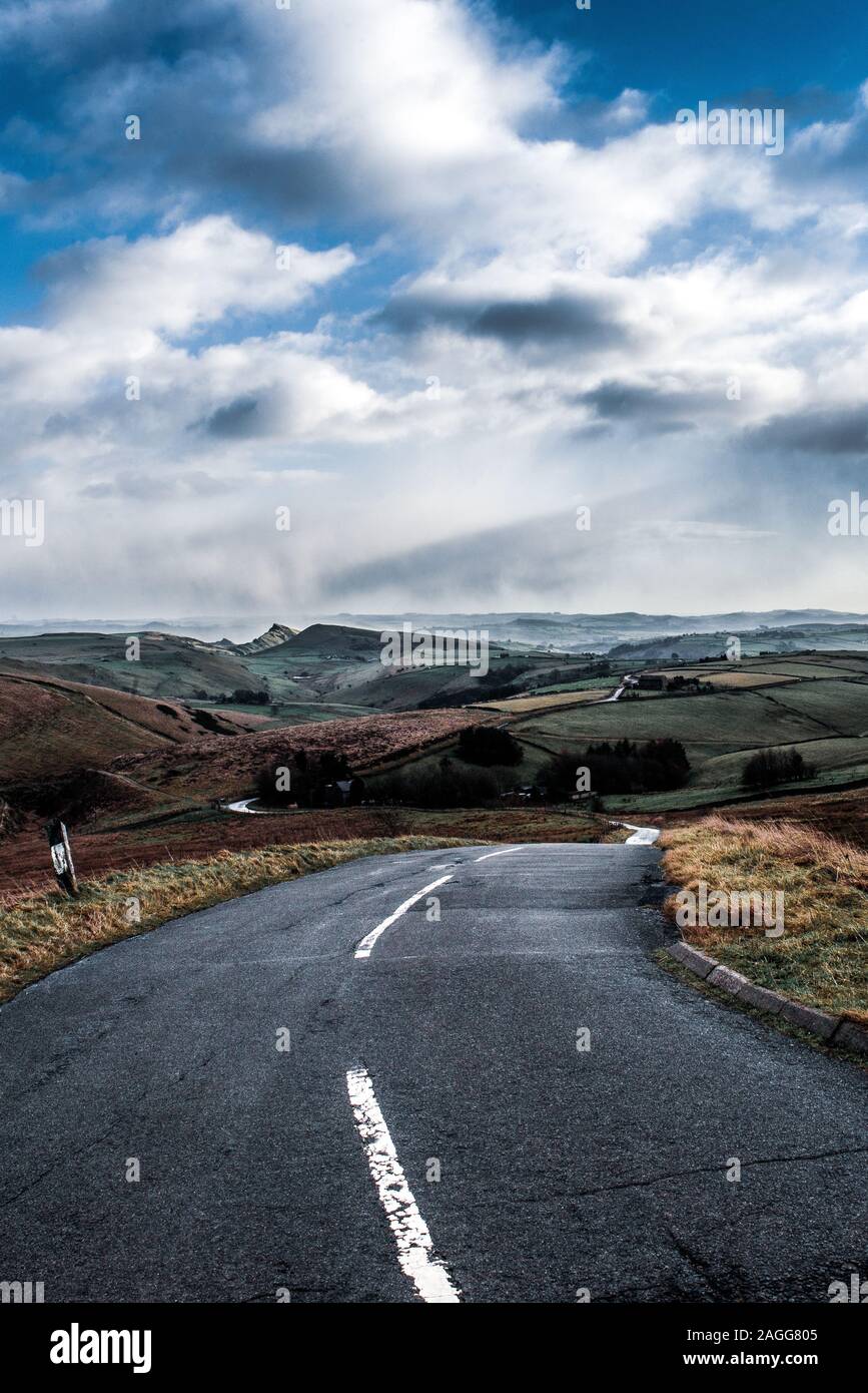 An empty road to nowhere. A quiet desolate, deserted, empty road in the ...