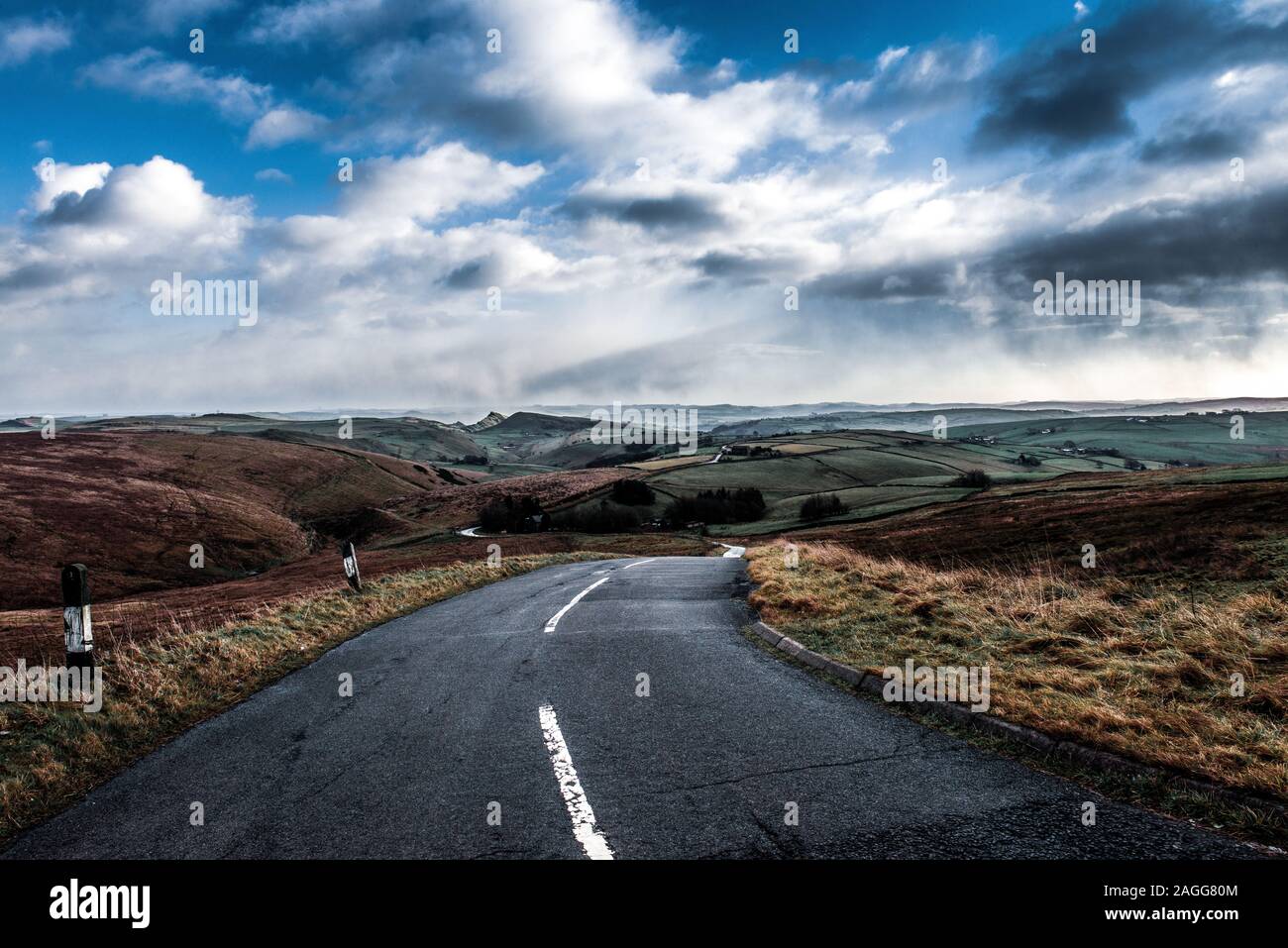 An empty road to nowhere. A quiet desolate, deserted, empty road in the ...