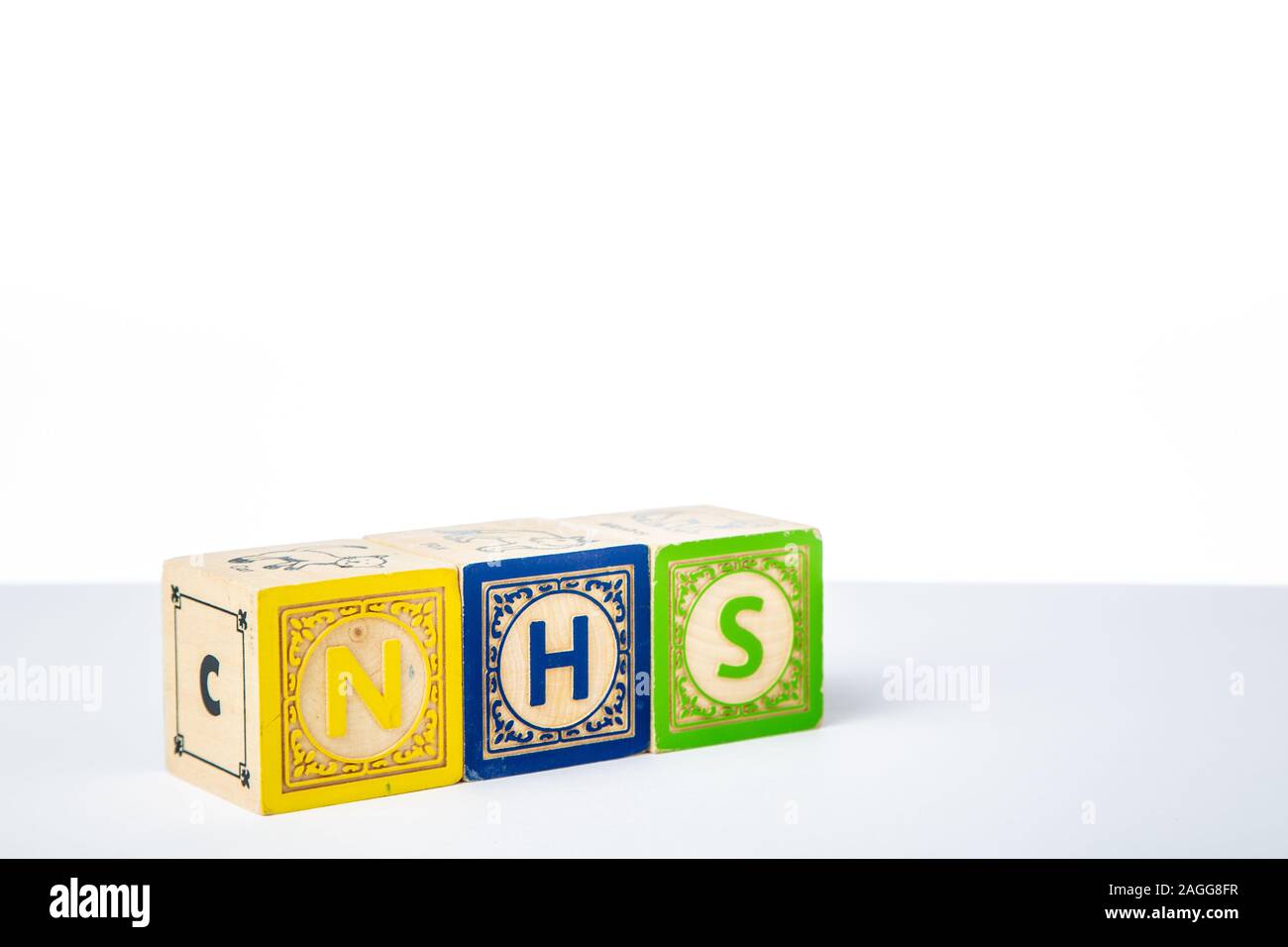 Childrens Wooden Alphabet Blocks Spelling the Word NHS Stock Photo - Alamy
