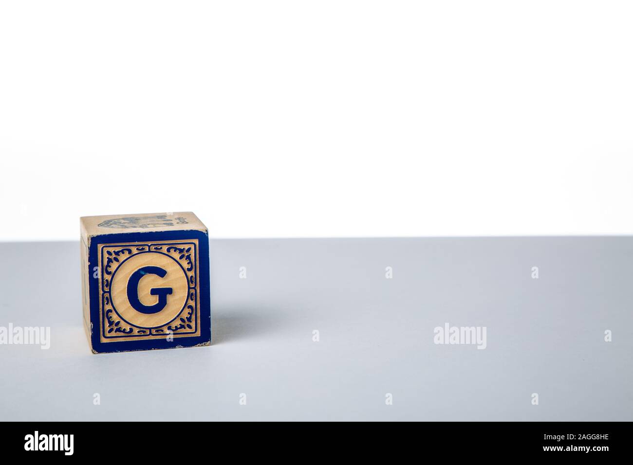Childrens Wooden Alphabet Block Showing the Letter G Stock Photo - Alamy