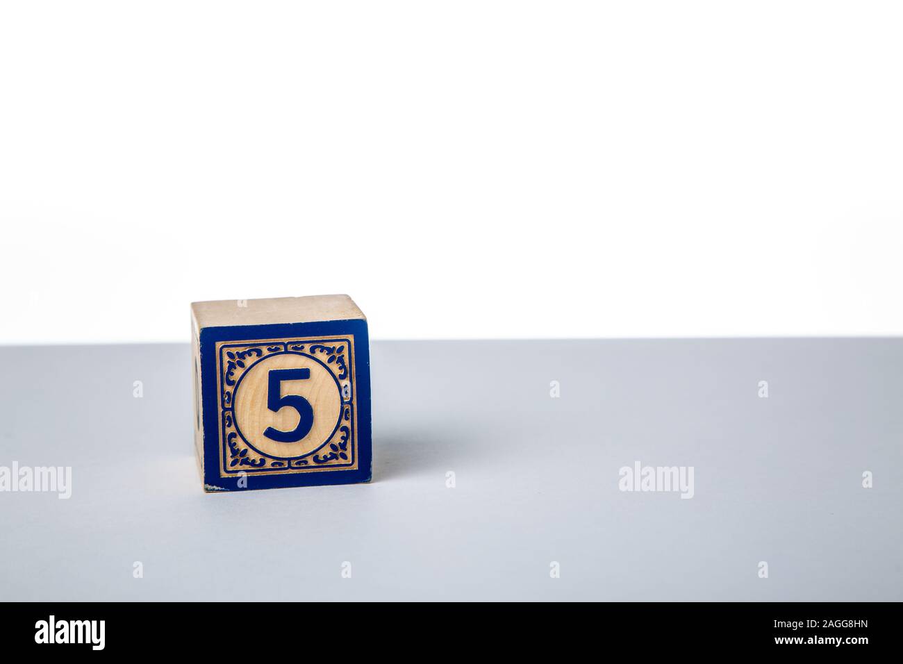 Childrens Wooden Alphabet Block Showing the Number 5 Stock Photo - Alamy