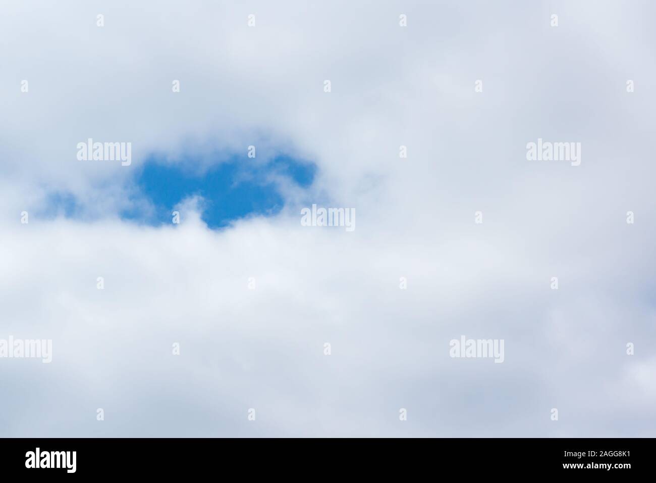blue sky with flying white light clouds Stock Photo - Alamy