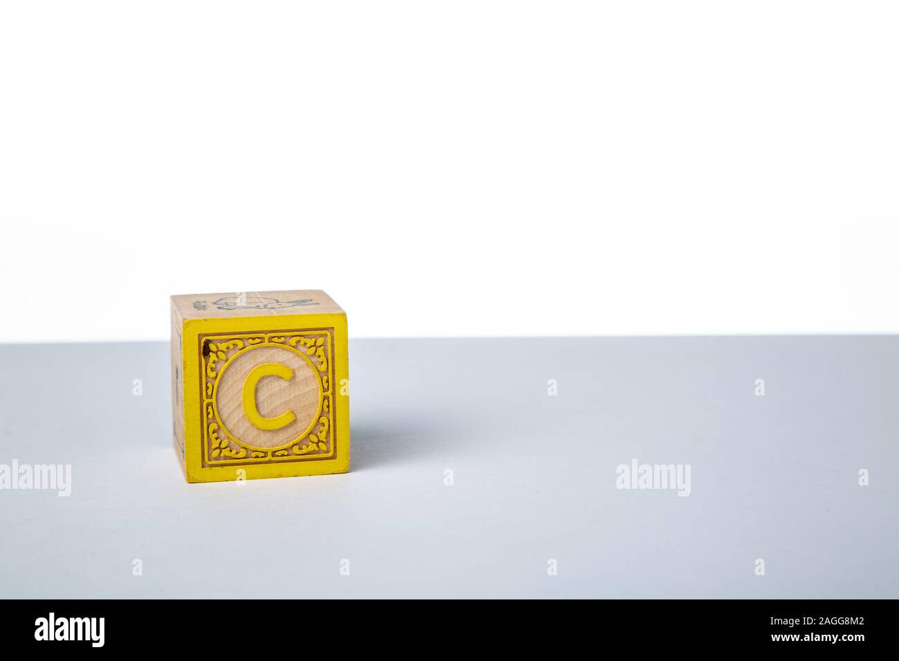 Childrens Wooden Alphabet Block Showing the Letter C Stock Photo - Alamy