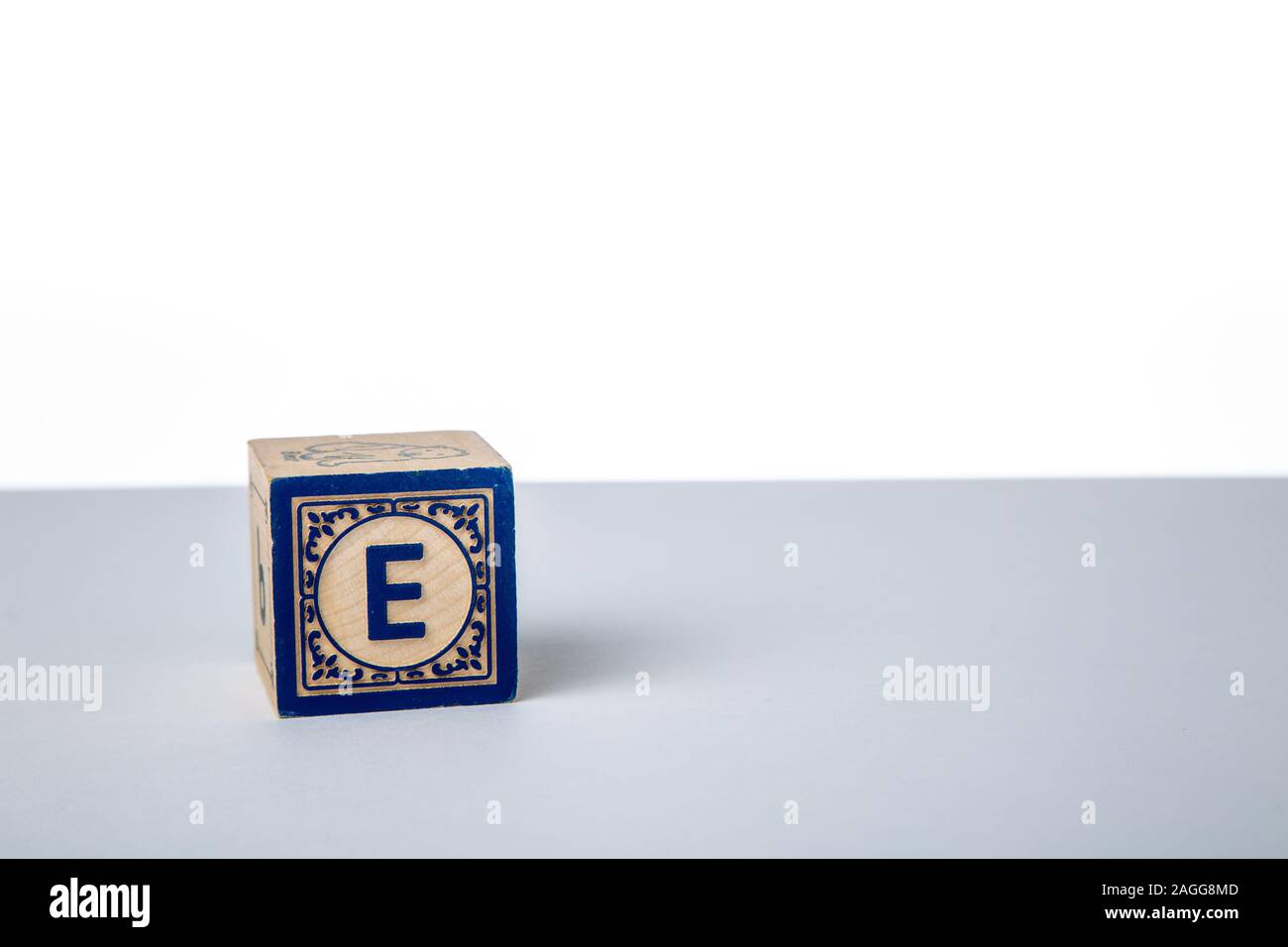 Childrens Wooden Alphabet Block Showing the Letter E Stock Photo - Alamy