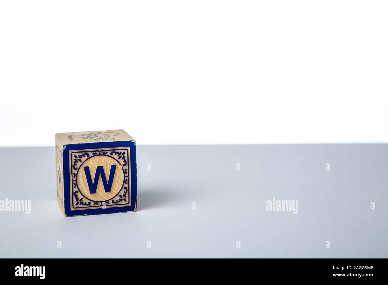 Childrens Wooden Alphabet Block Showing the Letter W Stock Photo - Alamy