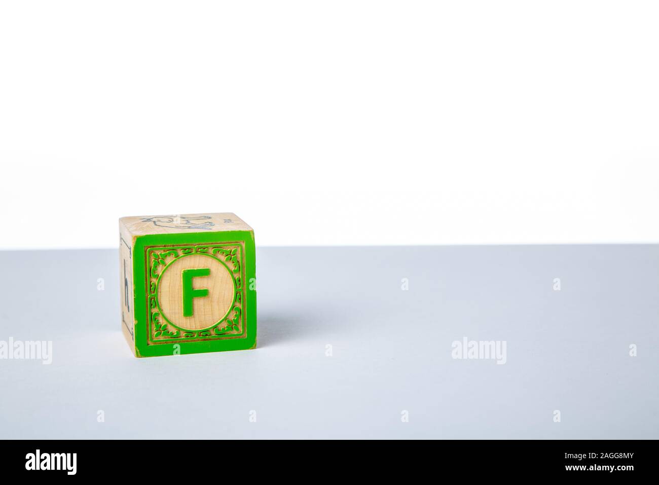 Childrens Wooden Alphabet Block Showing the Letter F Stock Photo - Alamy