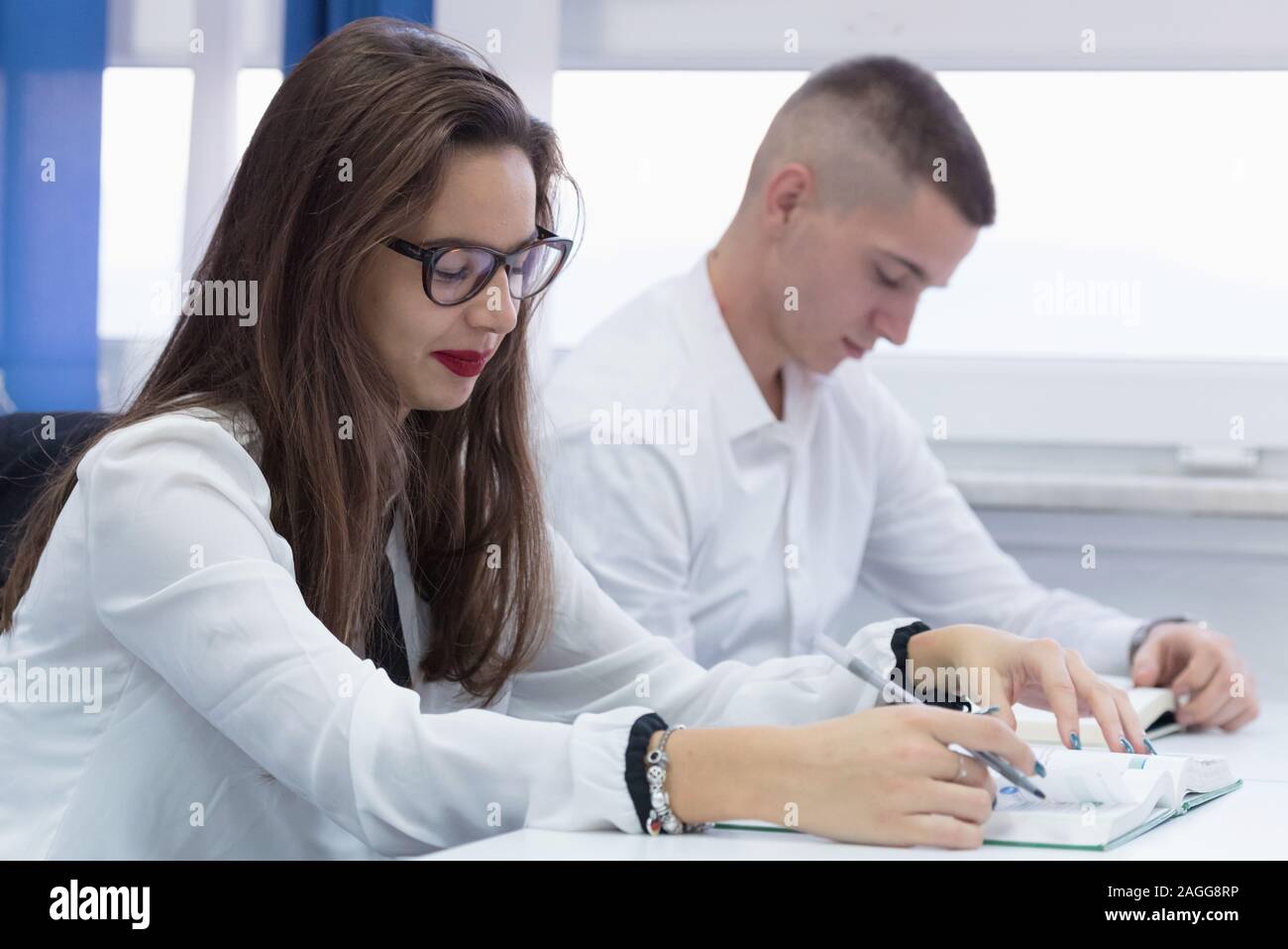 University Students during the class. Resolving problems together. Team ...