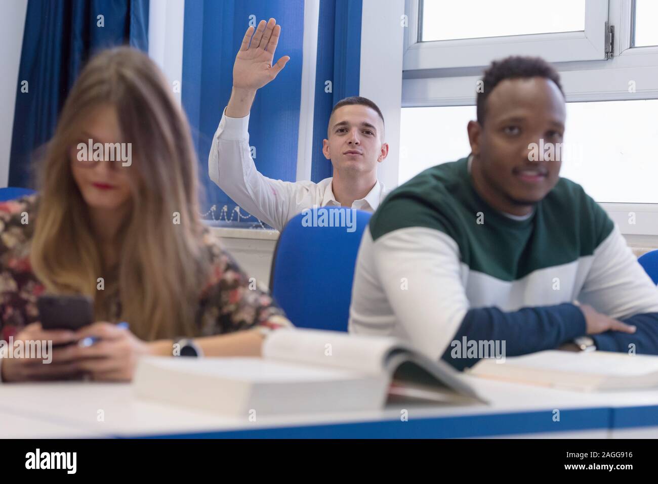 University Students during the class. Resolving problems together. Team ...