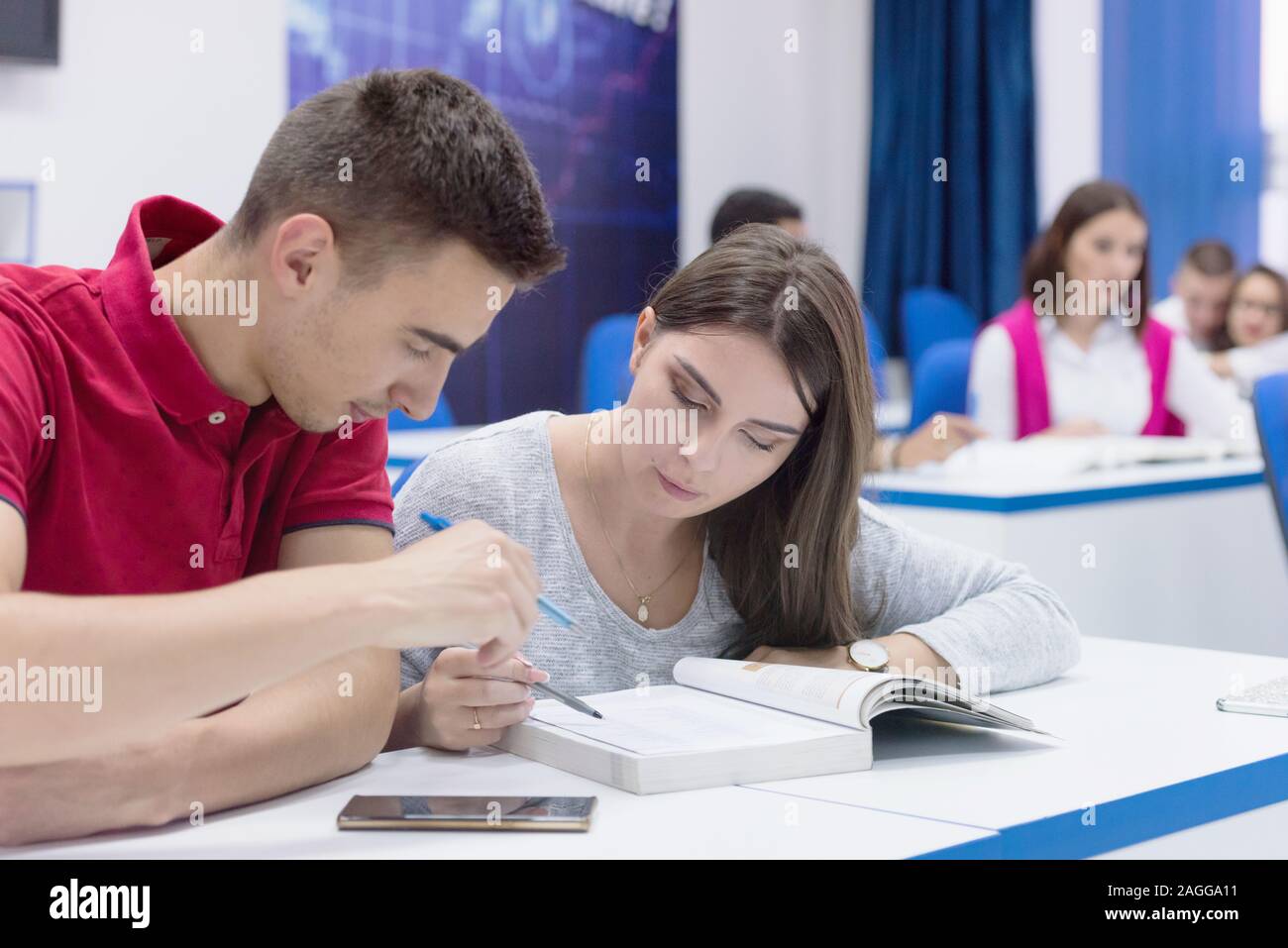 University Students during the class. Resolving problems together. Team ...