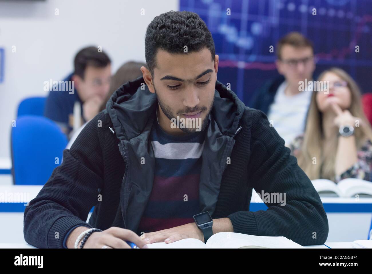 University Students during the class. Resolving problems together. Team ...