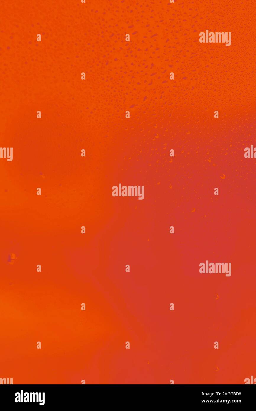 Bright red orange lush lava gradient background with drops of water ...