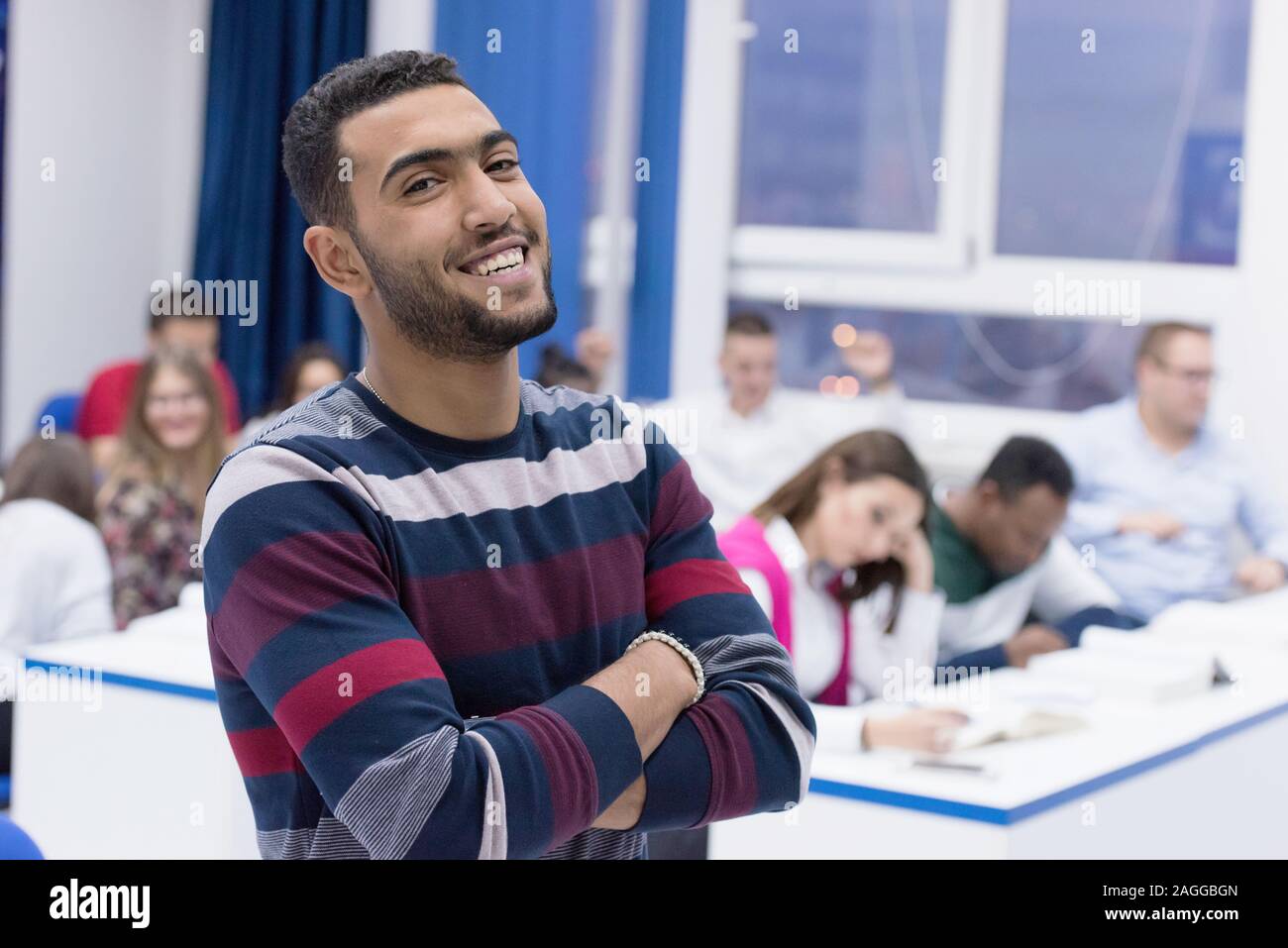 Students life on the campus.Portrait of male college student smiling ...