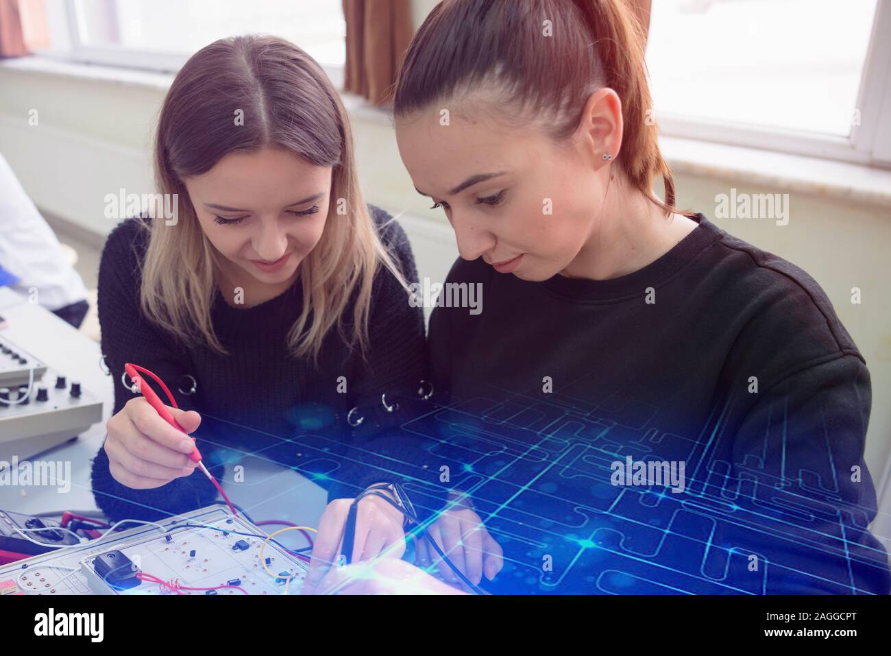 Two young students in technical vocational training, the lesson in ...