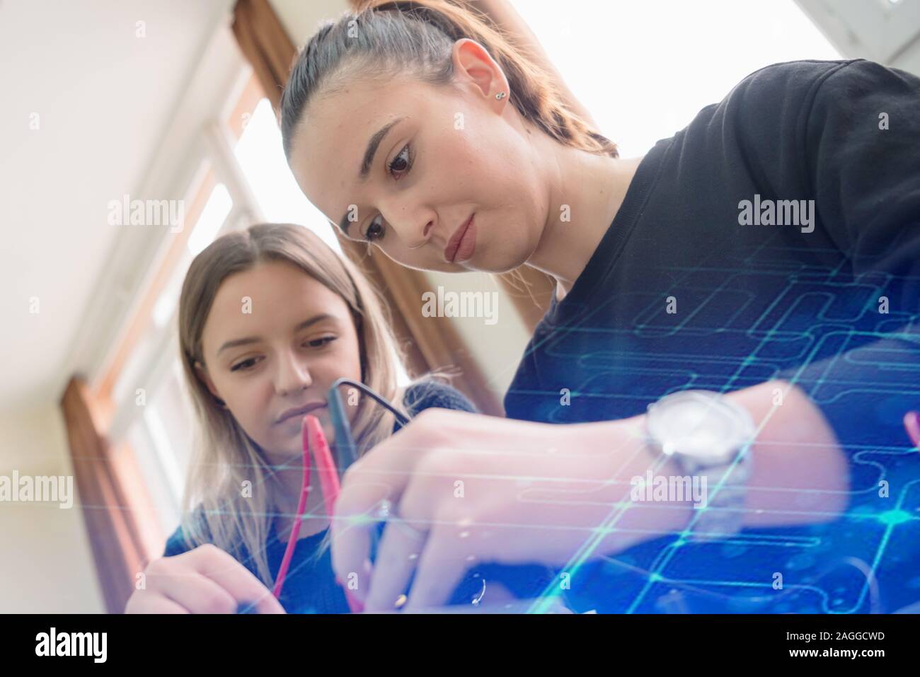 Two young students in technical vocational training, the lesson in ...
