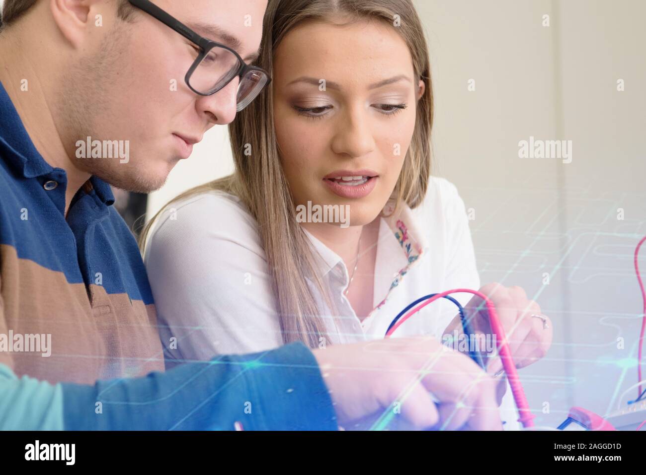 Two young students in technical vocational training, the lesson in ...