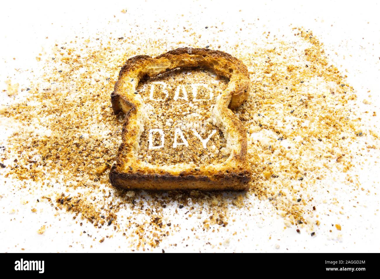 Toast burning with letter isolated on white background Stock Photo - Alamy