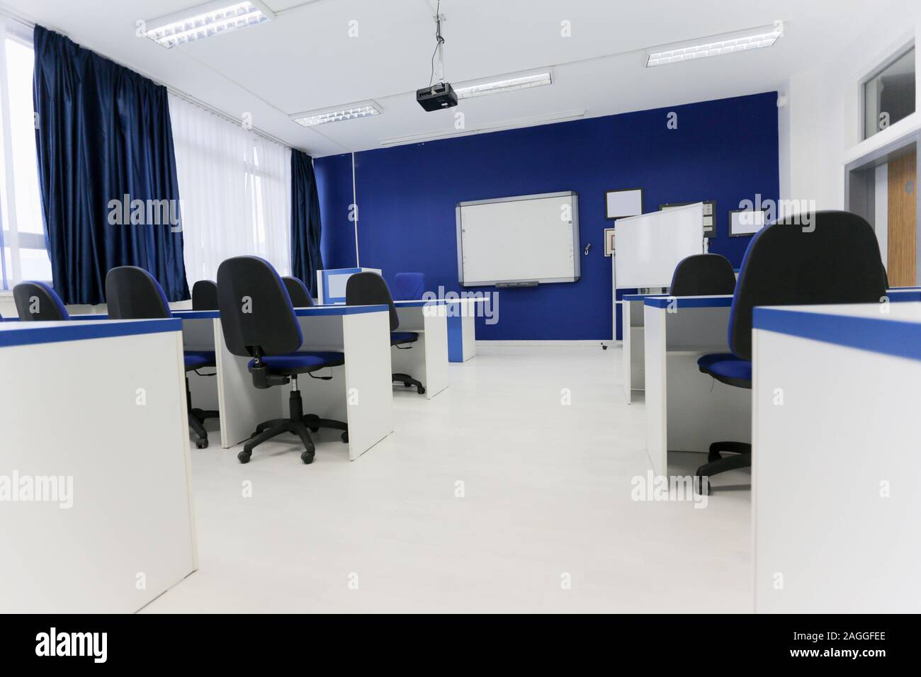 Modern school tables and students hi-res stock photography and images ...