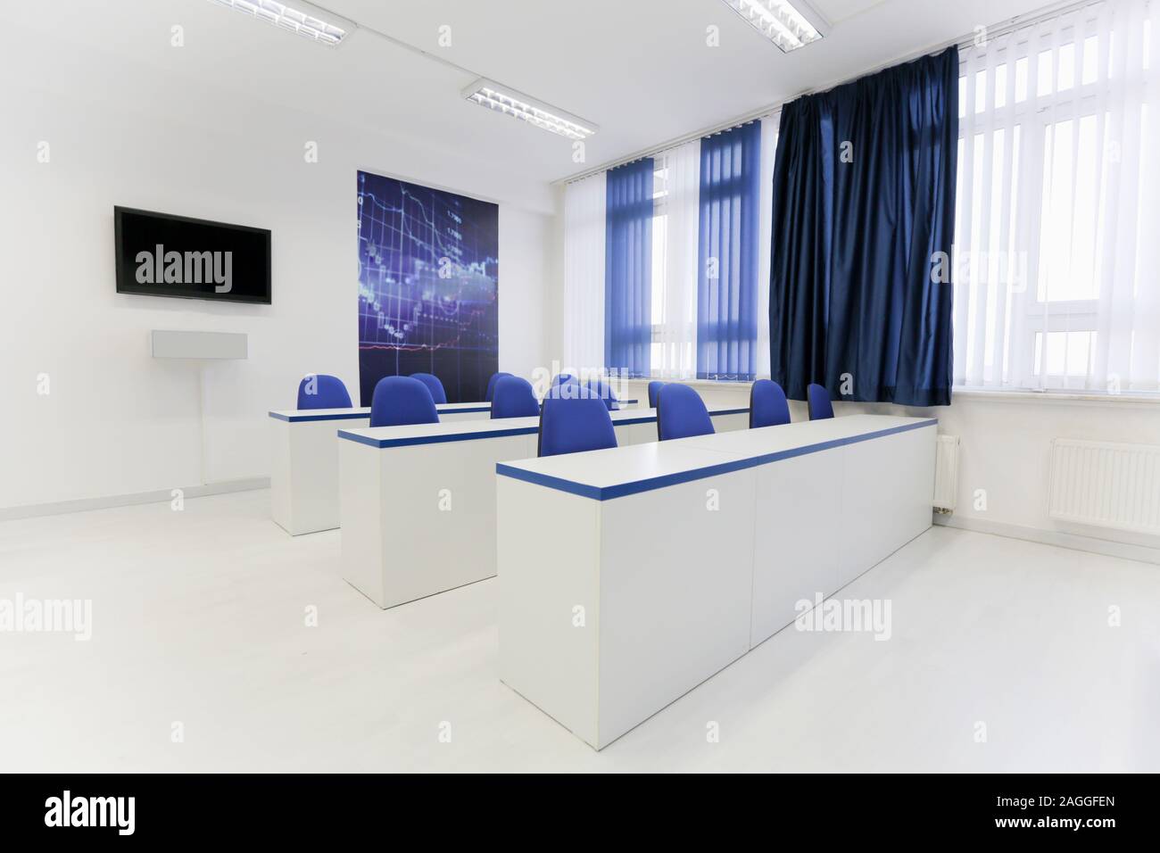 Economy school classroom without students or teachers with chairs and ...