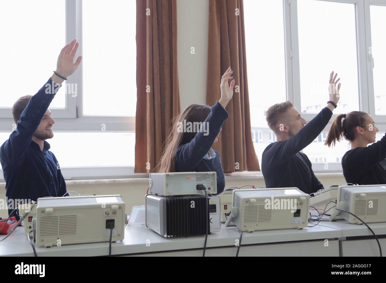 Group of young students in technical vocational training with teacher ...