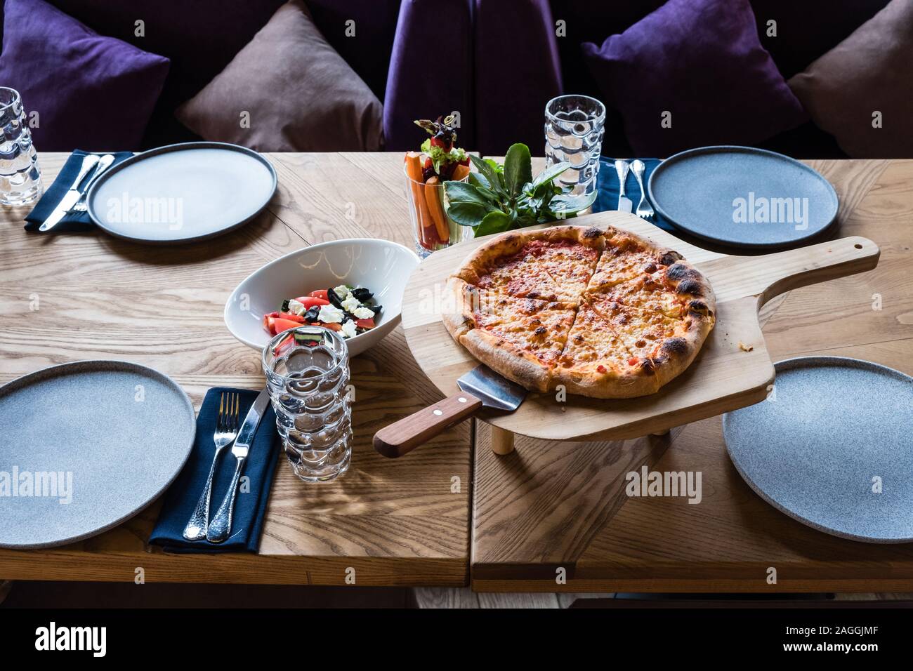 Italian pizza menu classic margarita pizza on the servered table with ...